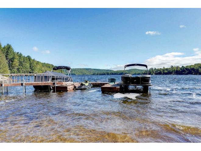 Magnifique chalet au bord de l’eau avec spa et plage privée (Lac de l ...